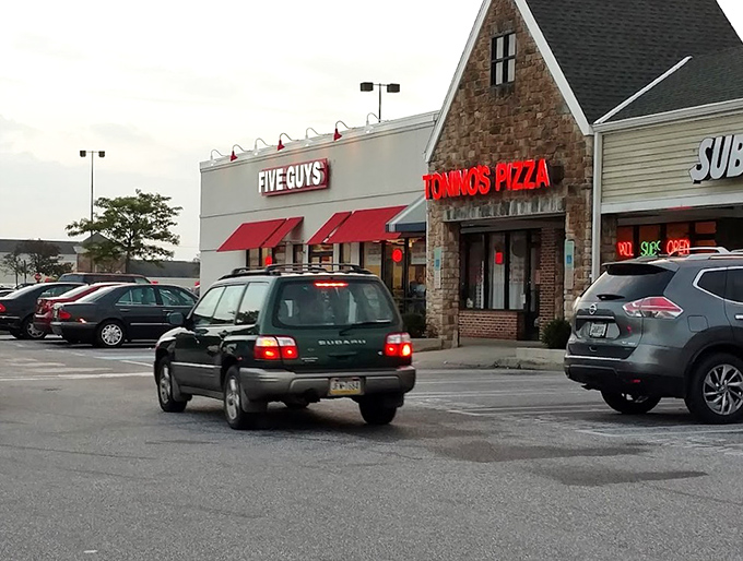 By day or night, that glowing Tonino's sign works like a tractor beam for anyone with good taste and a healthy appetite.