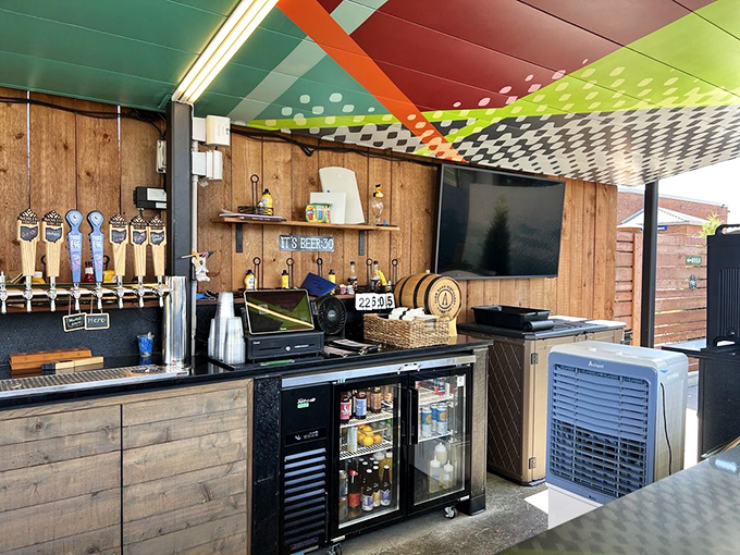 The outdoor bar area&mdash;where summer memories are crafted one tap pull at a time. Wood paneling never looked so inviting.