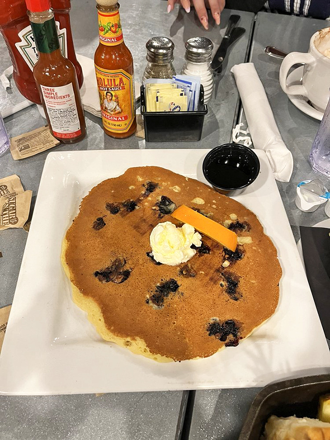 This pancake isn't just big&mdash;it's "needs its own zip code" big, with blueberries that pop like flavor fireworks in every bite.