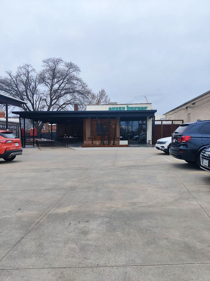 The unassuming exterior might fool passersby, but burger aficionados know exactly what treasures await inside.