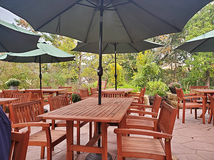 The outdoor patio offers nature's soundtrack with your meal. Those umbrellas aren't just for shade&mdash;they're keeping your food's secrets from passing birds.