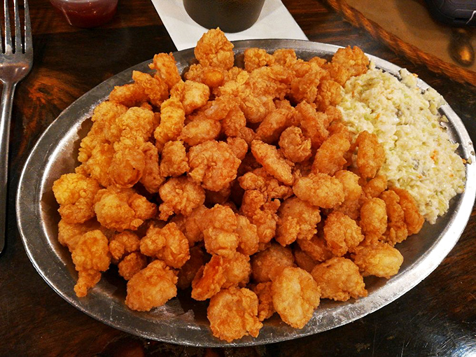 Popcorn shrimp piled high enough to make a mountain climber nervous &ndash; and worth every bite.