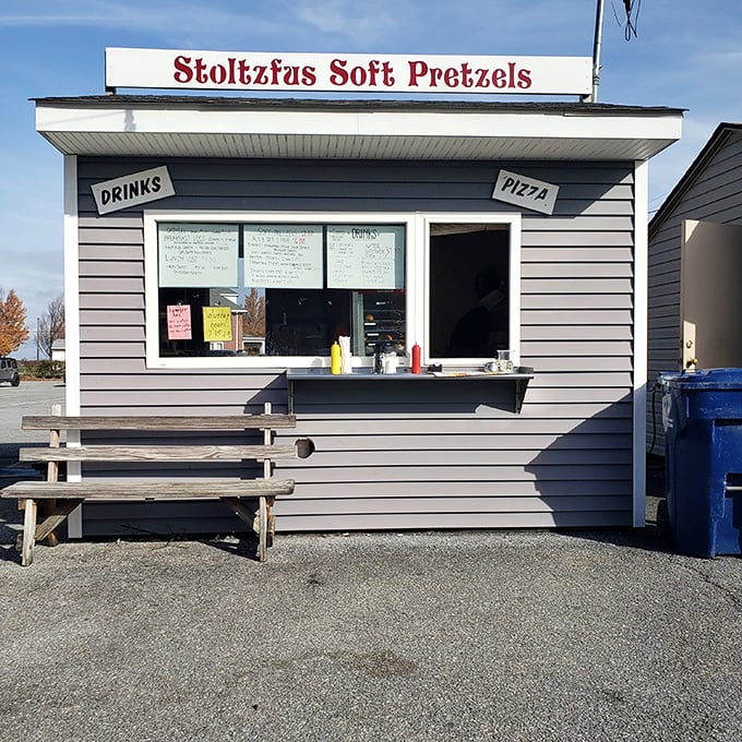 Stoltzfas Soft Pretzels&mdash;where carbs twist themselves into Pennsylvania's favorite form. The bench outside suggests you shouldn't attempt to walk while experiencing such perfection.
