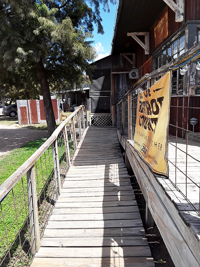 A wooden walkway that's practically a yellow brick road for hungry Texans, leading to flavors that make the journey worthwhile every time.
