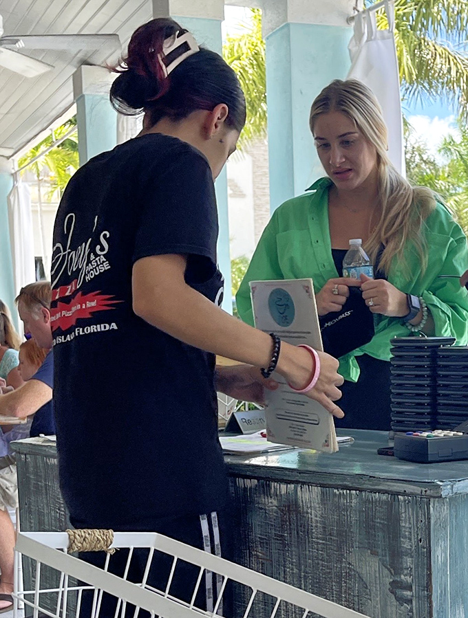 The moment of truth: getting your name on the list. In Florida breakfast hierarchy, this interaction is more important than most business meetings.