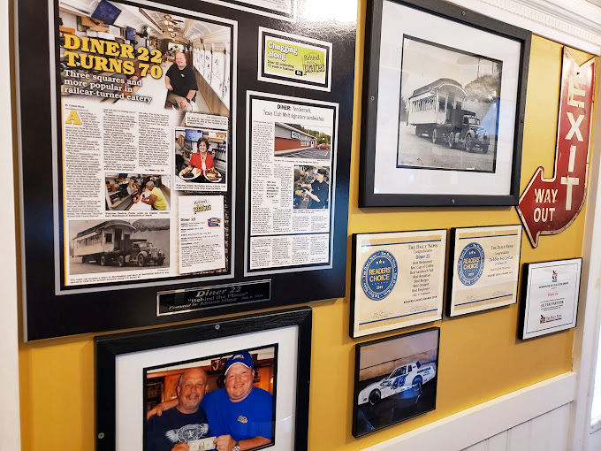 Wall displays showcase community recognition and local pride, telling the story of a beloved neighborhood institution.
