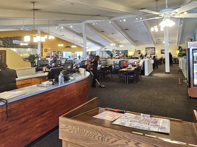 The spacious interior balances casual comfort with nautical charm. Those ceiling beams? Reminiscent of a well-appointed ship's galley.