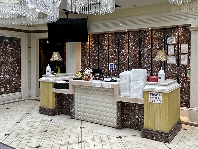 The reception area's elegant design sets expectations high from the moment you enter. First impressions matter, especially when crab legs are involved.