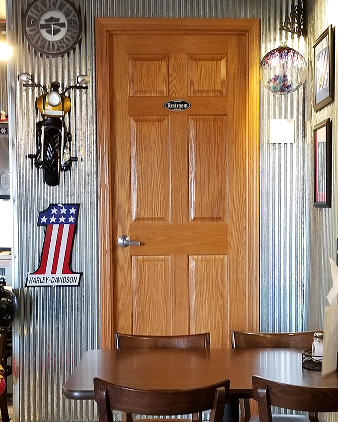 Even the restroom door has character. In BBQ joints, it's often the unassuming details that separate the legendary from the merely good.