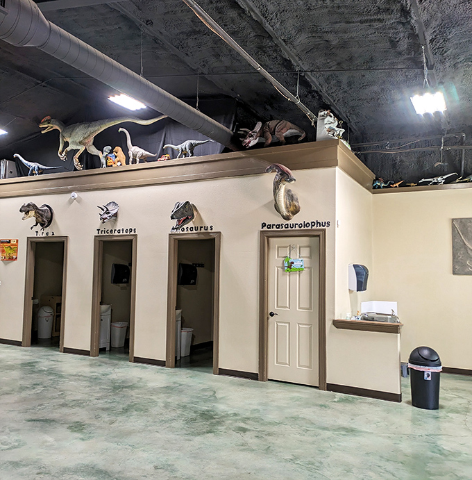 Even bathroom signs get the prehistoric treatment. T-Rex might have had tiny arms, but at least he had proper restroom facilities.