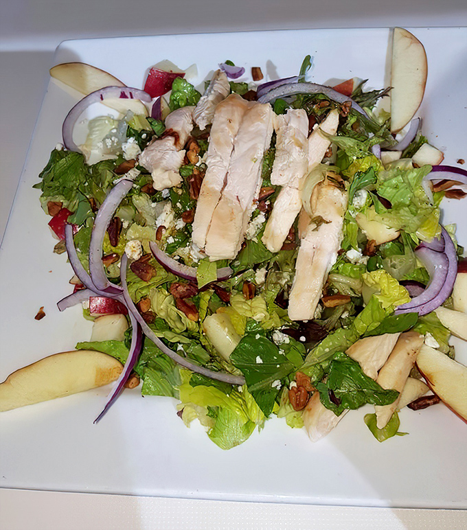 A salad that doesn't feel like punishment. Fresh greens, grilled chicken, and vibrant veggies prove that diners can do healthy without sacrificing flavor.