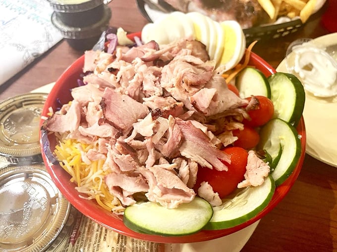 A salad that doesn't apologize for being at a barbecue joint. That turkey isn't a topping&mdash;it's the reason vegetables showed up in the first place.