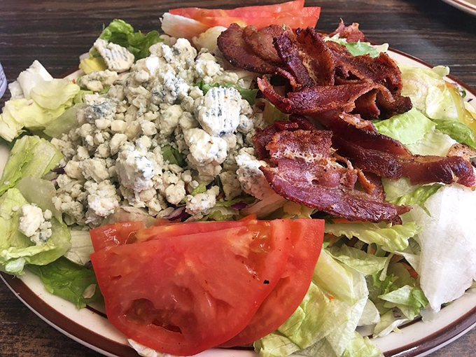 A salad that doesn't apologize for the bacon&mdash;proof that even the "healthy option" at a great diner knows how to have fun.