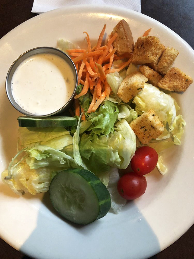 A salad that doesn't apologize for being healthy—it's too busy showing off its fresh ingredients and perfect dressing ratio.