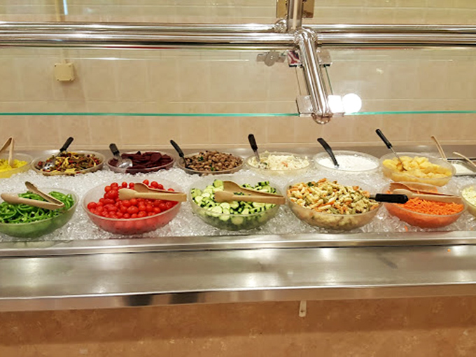 A salad bar that proves vegetables can be exciting too&mdash;fresh, colorful ingredients waiting to balance out all those breakfast indulgences.