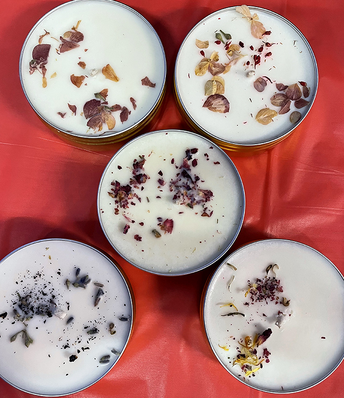 Botanical-infused candles that capture seasons in scent. These handcrafted luminaries bring warmth to mountain homes long after the market closes.