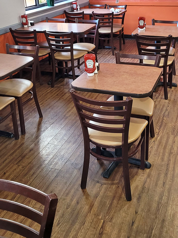 Tables arranged with just enough space for privacy but close enough to catch the aroma of your neighbor's French toast.