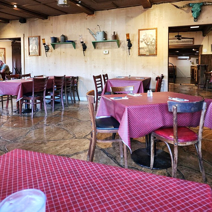 The dining room whispers of decades of celebrations, with each red-checkered table a stage for countless family stories and first dates.