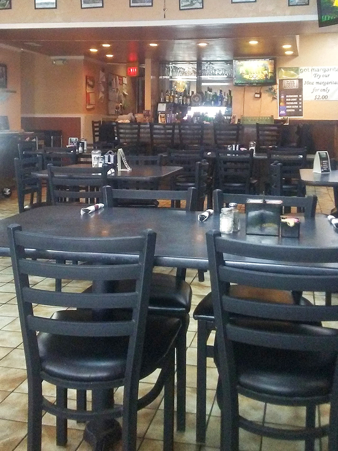 The dining room during the calm before the storm&mdash;tables patiently waiting for the next wave of hungry patrons.