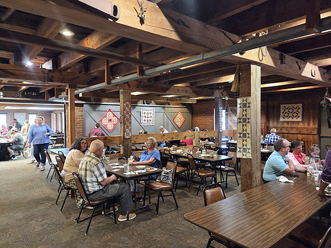 Where strangers become neighbors over plates of home cooking. The exposed beams and quilt decorations aren't just design choices – they're conversation starters.