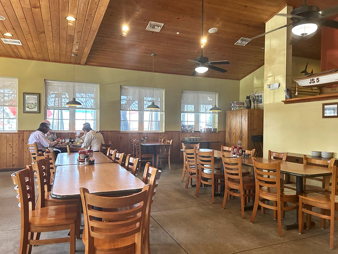 Dining room simplicity that lets the food and conversation be the stars. Those wooden chairs have heard more fishing stories than a marina at sunset.