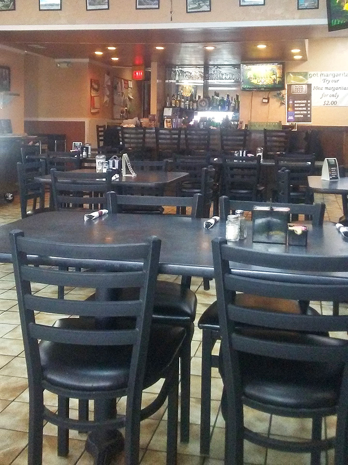 Empty chairs waiting for hungry patrons like a scene from an Edward Hopper painting. The calm before the breakfast storm.