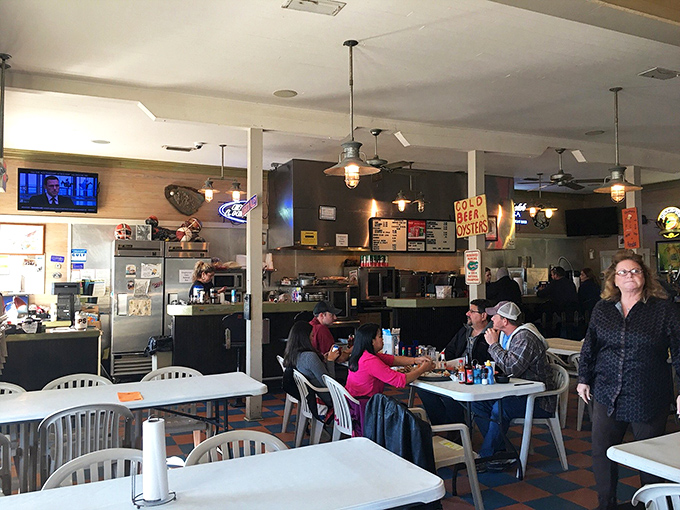 Where strangers become friends over seafood. The simple dining room buzzes with the sound of happy eaters and cracking shells.