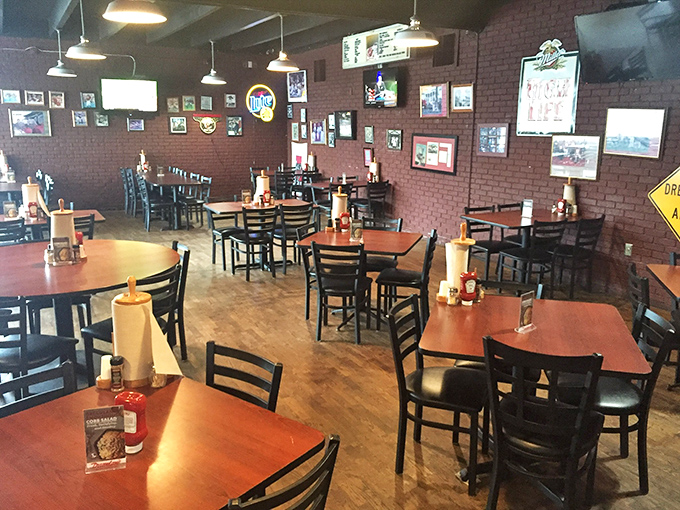 Tables waiting for barbecue pilgrims like church pews on Sunday – simple, functional, and ready to host moments of food worship.