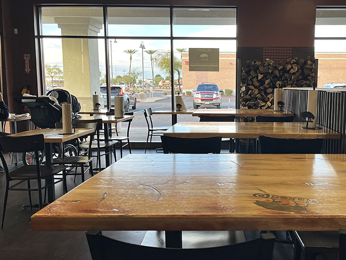 Wooden tables bathed in Arizona sunshine. The stage is set for a barbecue performance that will leave you planning your next visit.