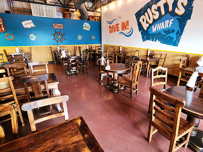 "Dive In!" urges the wall, and diners happily comply, settling into wooden chairs at tables that have hosted countless seafood celebrations.