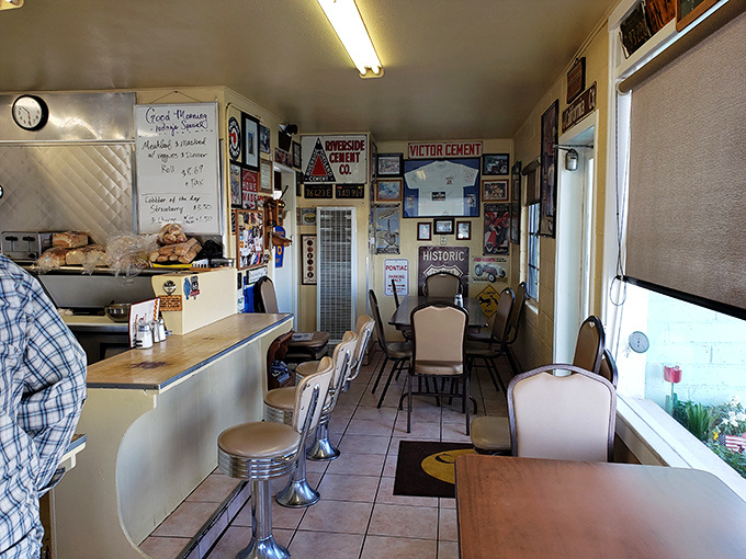 A dining room where every square inch tells a story. Those walls have absorbed decades of laughter, gossip, and the occasional trucker's tall tale.