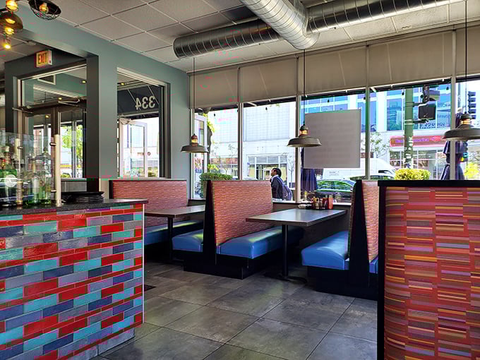 Modern diner aesthetics with colorful tile work and comfortable booths&mdash;the perfect setting for contemplating a second helping of French toast.