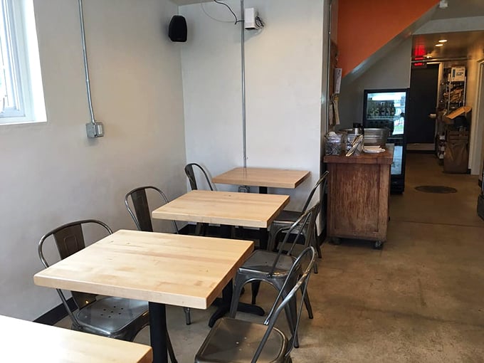 Simple wooden tables and metal chairs say, "We put our energy into the food, not fancy furniture," and honestly, that's exactly the right priority.