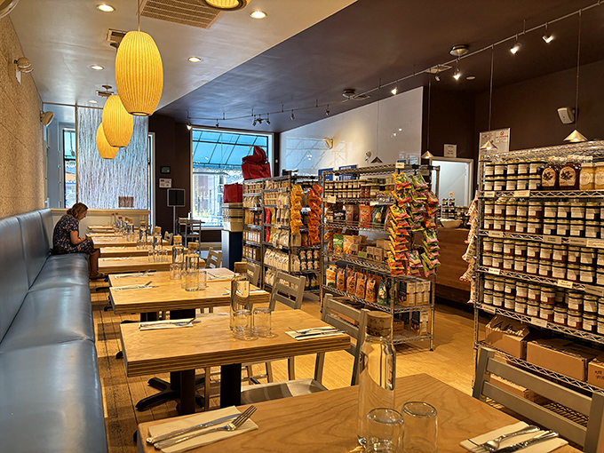 Where strangers become friends over the shared religion of exceptional breakfast. The grocery shelves aren't background&mdash;they're intermission entertainment.