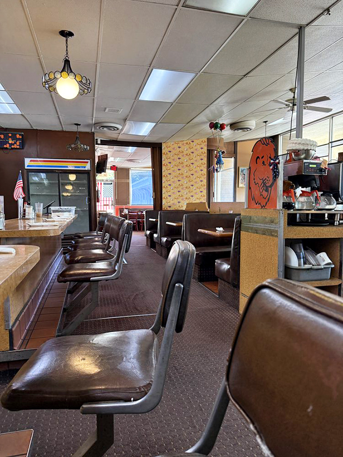 Counter seating where breakfast dreams come true&mdash;these well-worn stools have supported generations of pancake enthusiasts.