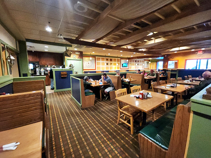 Classic diner seating where strangers become friends and every meal feels like a neighborhood celebration.