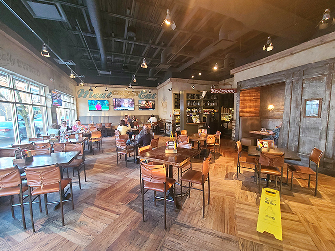 A dining room that balances casual comfort with thoughtful design. Those wooden tables have heard countless "mmms" and "you've got to try this" conversations.