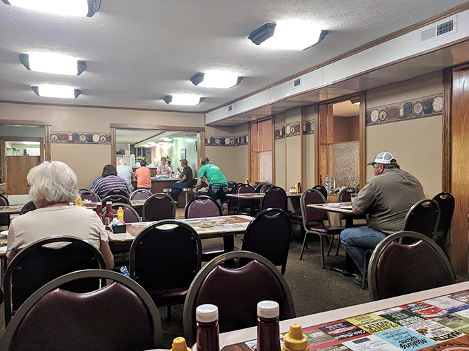 The dining room hums with conversation as regulars and first-timers alike share the universal language of good food and better company.