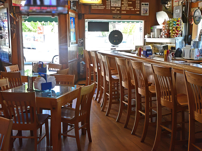 The bar stools have supported generations of regulars, each with their own stories and preferred burger toppings.