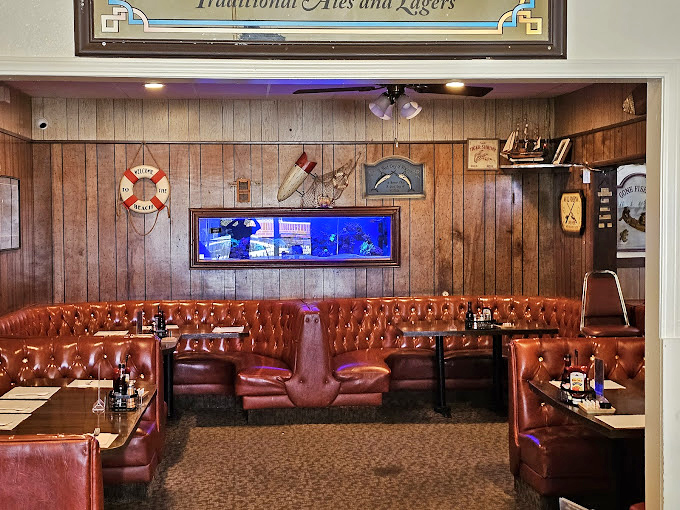 Cozy booths invite lingering conversations over plates of perfectly prepared ocean-to-table delights and local wines.