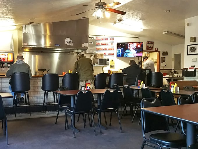 The counter seating at Jimmy's&mdash;where breakfast dreams come true and strangers become friends over coffee and gravy discussions.
