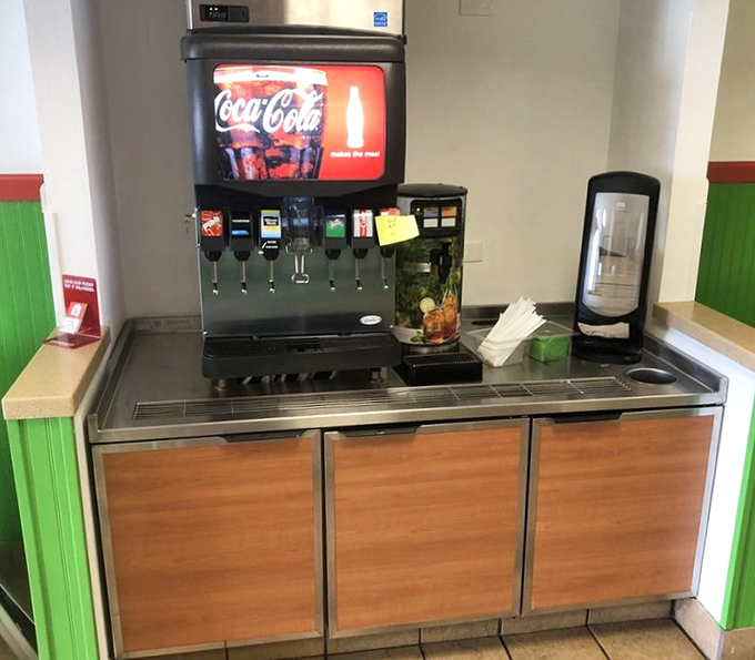 The self-service beverage station stands ready to provide the perfect liquid companion to your sandwich masterpiece &ndash; because great food deserves proper hydration.