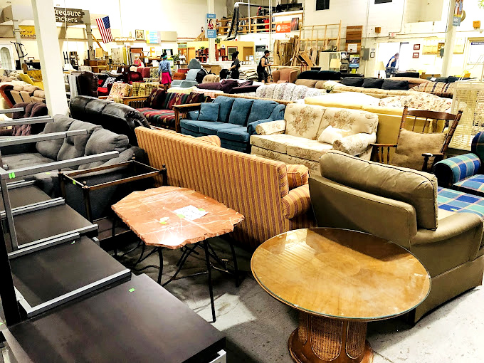 Sofa city! That teal mid-century modern piece is practically begging to become the conversation starter in your living room makeover.