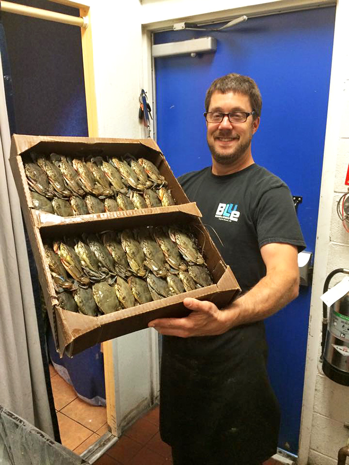 The face of someone who knows exactly how fresh his seafood is. When your supplier is this excited about soft shell crabs, you know you're in good hands.