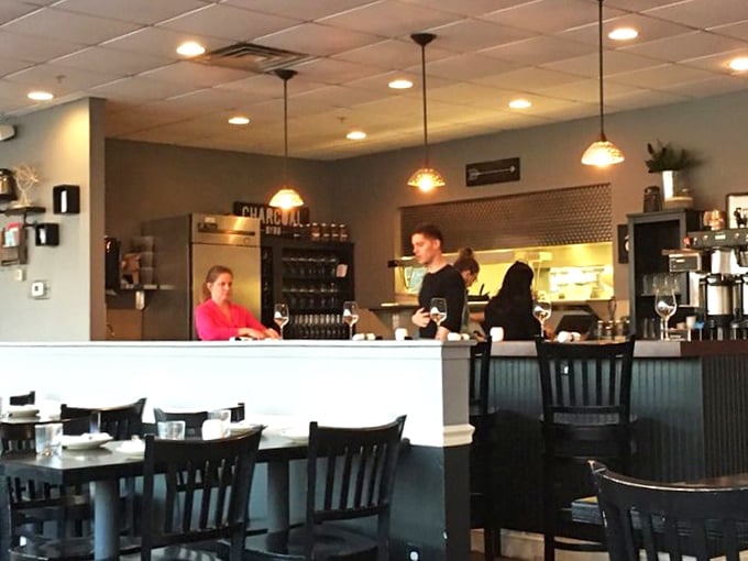 Where the magic happens&mdash;the open kitchen design lets you witness culinary choreography while building delicious anticipation for what's heading to your table.