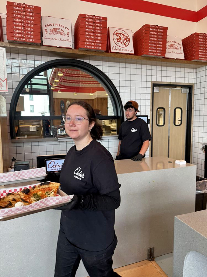 Pizza delivery in progress&mdash;that focused expression says "I'm carrying something more valuable than gold" and honestly, they're not wrong.