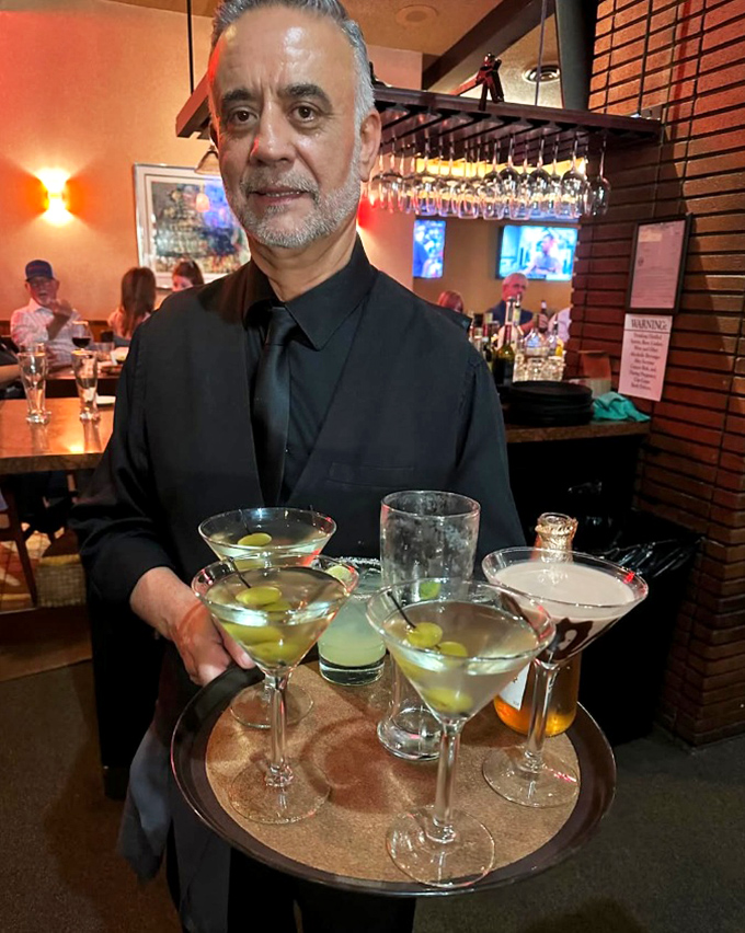 The staff serves martinis with the steady hands of surgeons and the warm smiles of people who genuinely want your evening to be spectacular.