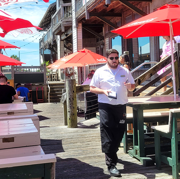 The outdoor dining area offers that quintessential Florida experience &ndash; fresh seafood enjoyed in the fresh air, with attentive service that makes everyone feel like a regular.