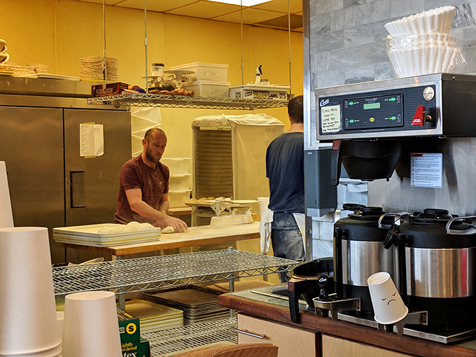 Artisans at work with the focus of surgeons. There's something deeply reassuring about watching someone who truly knows their craft shape dough with such care.