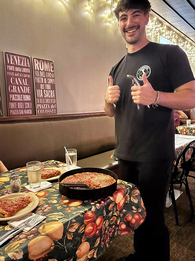 The thumbs-up says it all&mdash;when you're serving pizza this good, confidence comes naturally.